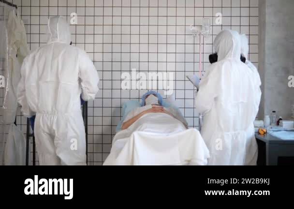 Doctor hazmat suits Stock Videos & Footage - HD and 4K Video Clips - Alamy