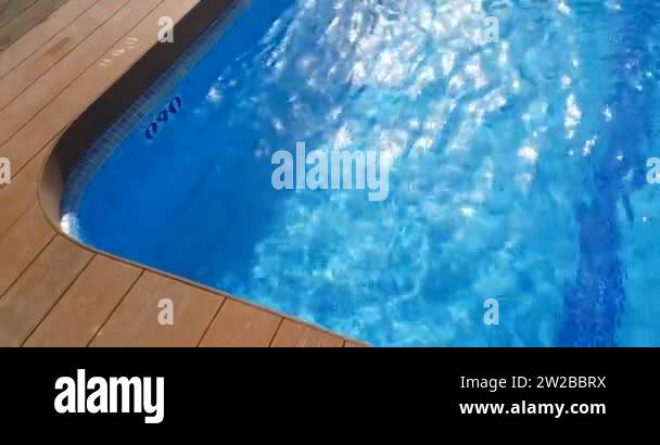 swimming pool surface caustics ripple like sea water and flow with ...