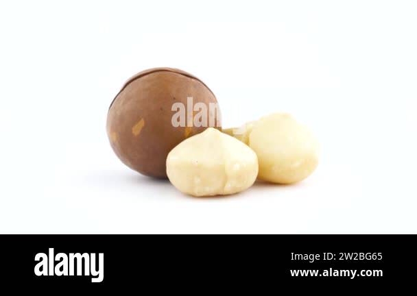 two whole and one half macadamia nut kernels Stock Video Footage - Alamy