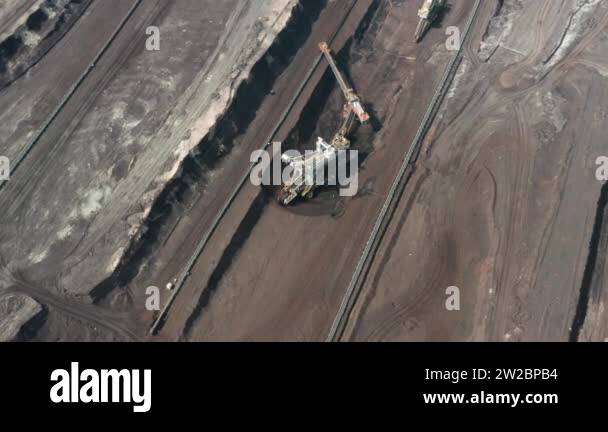 Rotation around of a mining quarry of coal or natural raw material ...