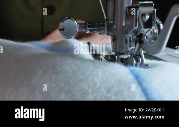 super close-up, details. sewing process on a sewing machine, zigzag ...