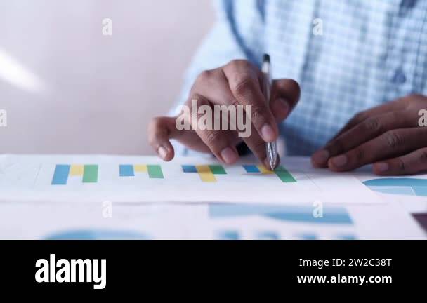 Analyzing chart Stock Videos & Footage - HD and 4K Video Clips - Alamy