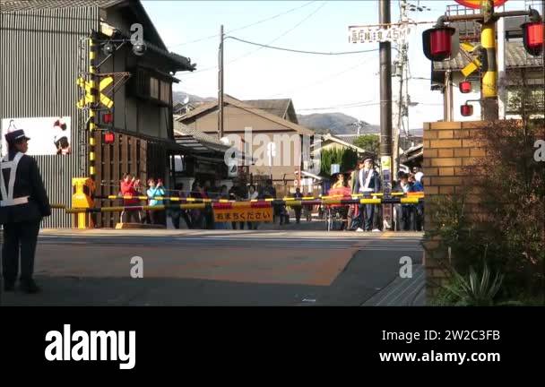 Kyoto, Japan - December 1, 2019: Japanese railway crossing guard ...