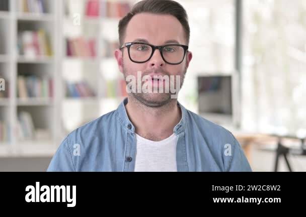 Young man shocked in Stock Videos & Footage - HD and 4K Video Clips - Alamy
