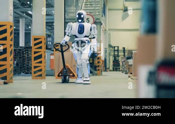 Humanoid robot moving boxes Stock Videos & Footage - HD and 4K Video ...