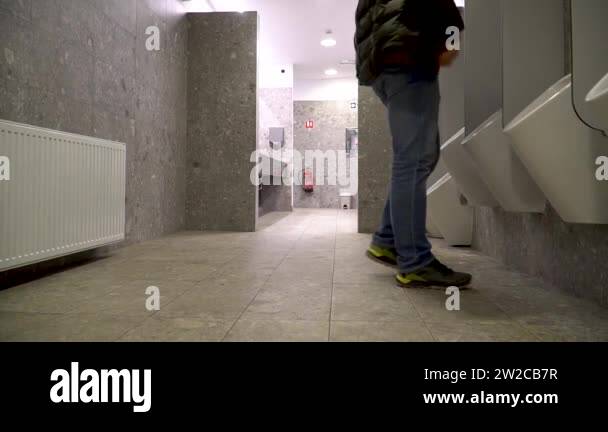 Man going toilet Stock Videos & Footage - HD and 4K Video Clips - Alamy
