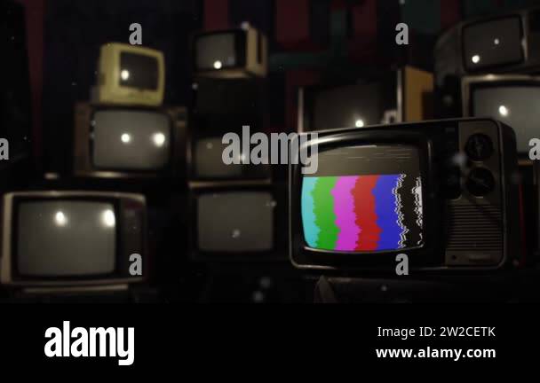 Antique TV Set with Color Bars over a Retro TV Wall. Dust Particles ...