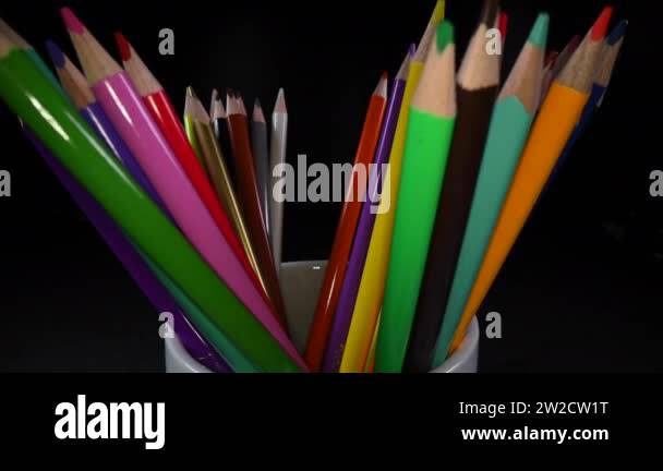 Push In Through Colored Pencils in Mug with dark background Stock Video ...