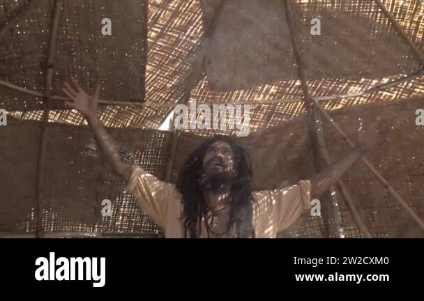 Shamanic session in the bungalow. Shaman during prayer during prayer ...