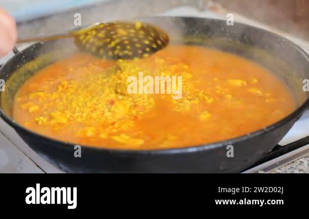 Preparing paella. Spanish traditional food Stock Video Footage - Alamy