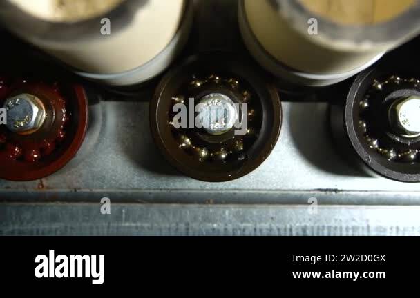 Rotating of metal parts in mechanical device. Spinning mechanism of ...