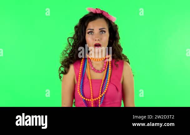 Very surprised girl very happy. Green screen at studio Stock Video ...