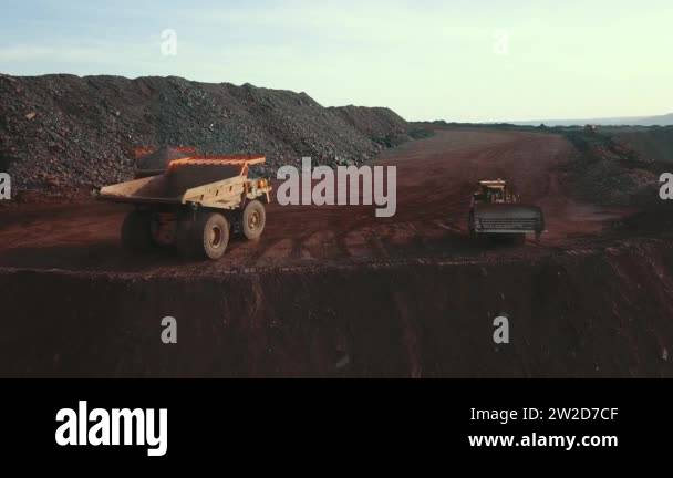 huge trucks dump trucks mining trucks ore transportation iron quarry ...