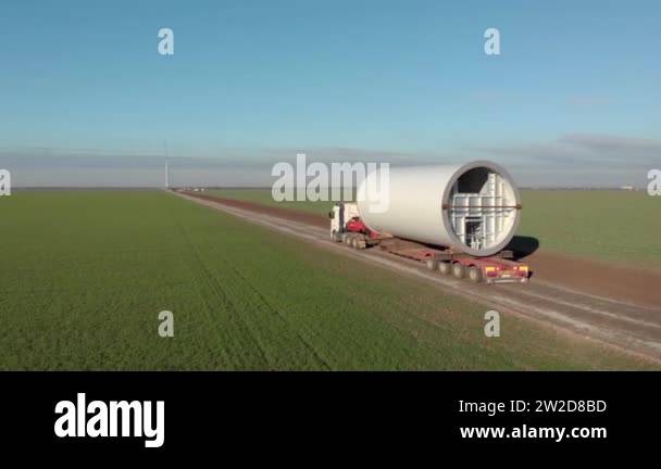 Building process of wind energy power tower, windmill under ...