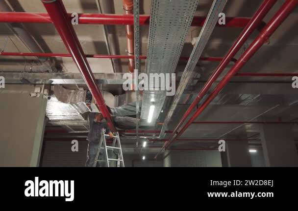 An employee who does the installation of ventilation systems in a new ...