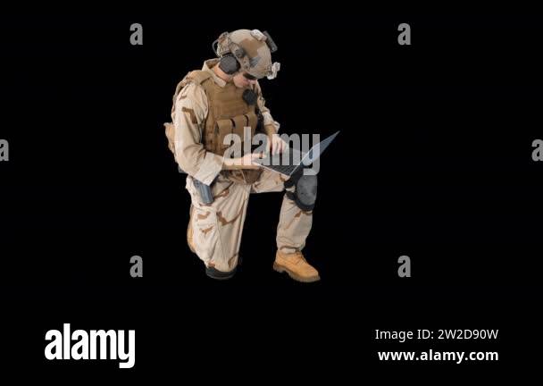 Soldier using laptop and Radio For Communication During Military ...