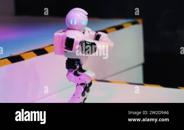 Dancing robot close up. Smart technology concept. Closeup of smart robots dance. Robotic dance ...