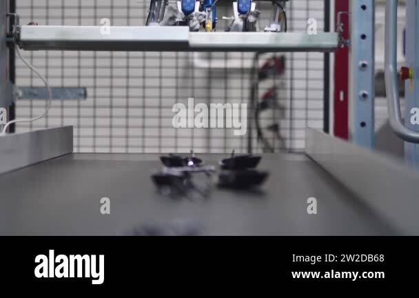 Close up - Automatic Plastic Injection Molding Machine, Robotics Arm ...