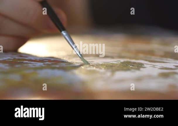 Coloring picture by numbers with acrylic paints with brush, painting ...