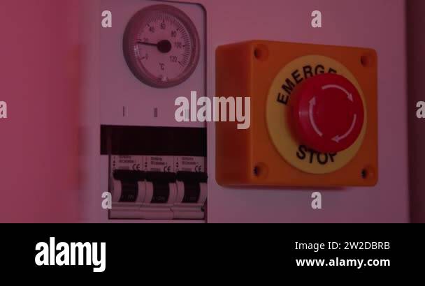 Pushing Red Emergency Stop Switch with Alarm Red Lights Signal on the ...