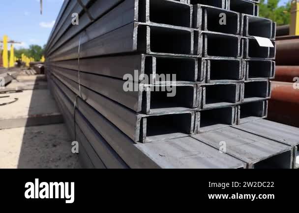 The metal channel laid in rows in the open metal warehouse, the large ...