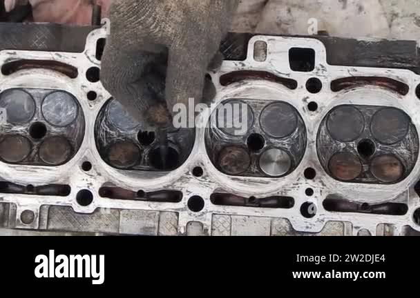 Burnt exhaust valve. Valve block of the engine of the car Stock Video ...