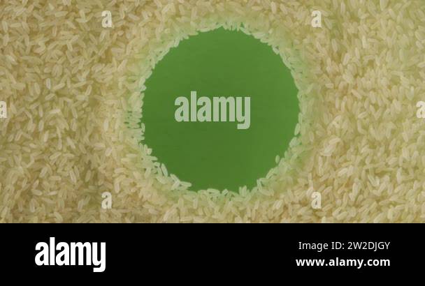 Rotation of rice grains scattered in a circle with space in the center ...