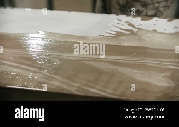 Working in the concrete industry - washing concrete slab with water ...