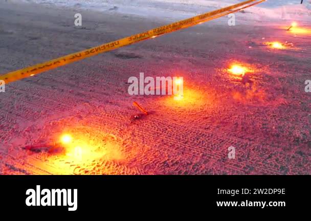 Police crime scene with flares on the ground and crime tape Stock Video ...