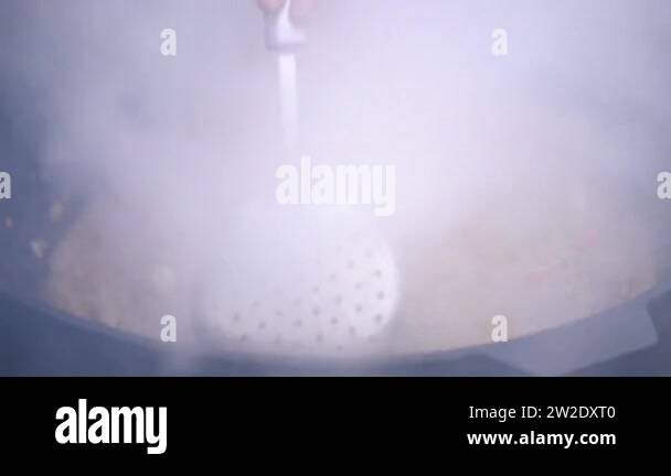 Fire pot rice Stock Videos & Footage - HD and 4K Video Clips - Alamy
