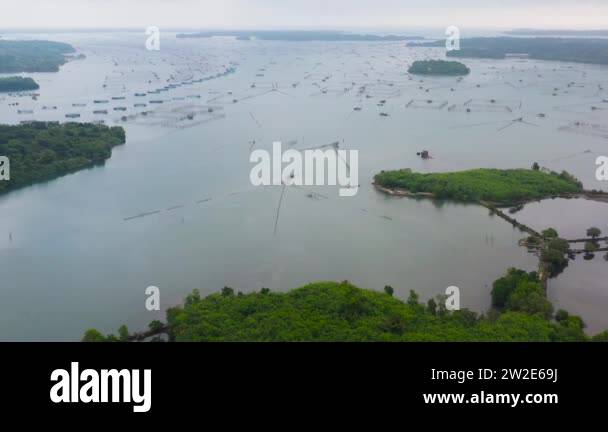 Fish farm with cages for fish and shrimp in the Philippines, Luzon ...