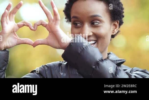 Smiling girl love symbol Stock Videos & Footage - HD and 4K Video Clips ...