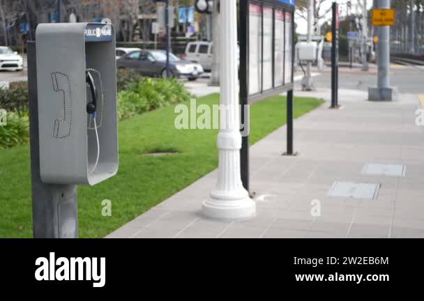 Retro coin-operated payphone station for emergency call on street ...