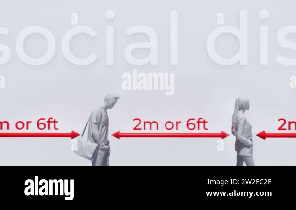 Abstract unrecognizable people waiting in line and keeping safe ...