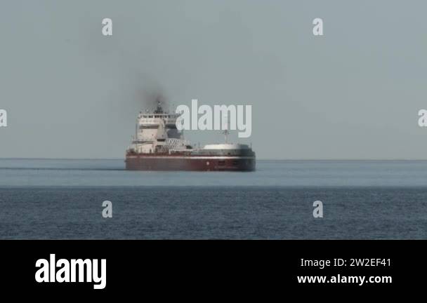 Ore ship with full load arriving to port on Lake Superior in Duluth ...