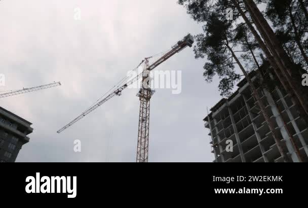 Construction Process of Skyscraper with cranes. High crane works on ...