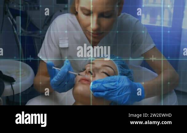 Animation of green grid moving over female nurse injecting female ...