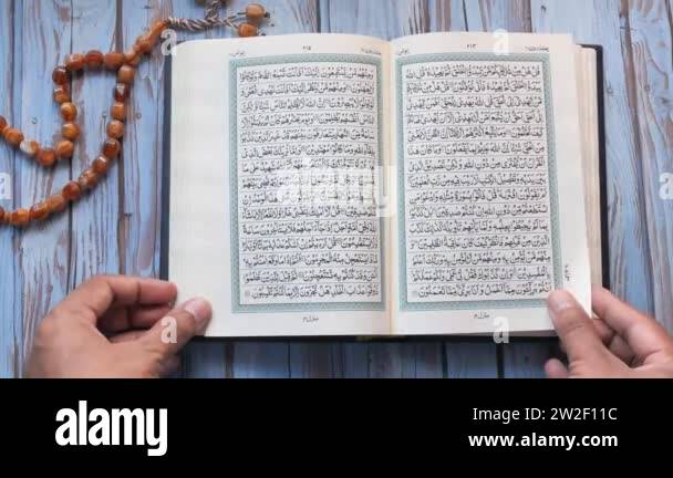 Reading quran Stock Videos & Footage - HD and 4K Video Clips - Alamy