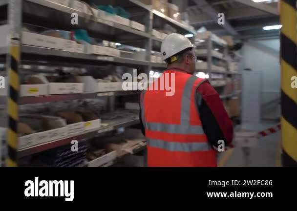 Worker goes through check Stock Videos & Footage - HD and 4K Video ...