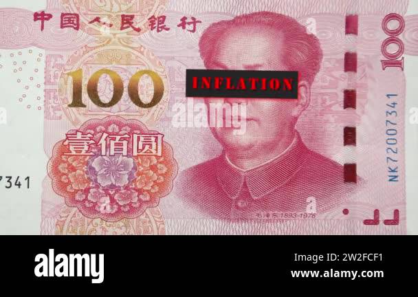 Portrait of Mao Zedong from a 100 Yuan bill with a closed eyes and the ...