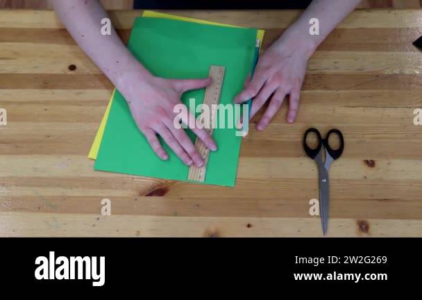 Faster paper work with top view paper. Drawing lines on colored paper ...