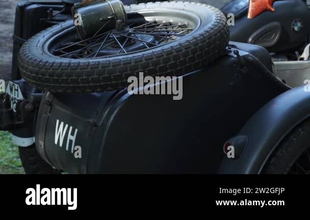 Old bmw motorcycle with machine gun. Reconstruction of the fighting.The ...