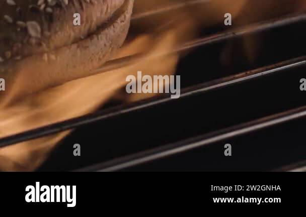 Process of cooking bread with grates and open fire, traditional recipe ...