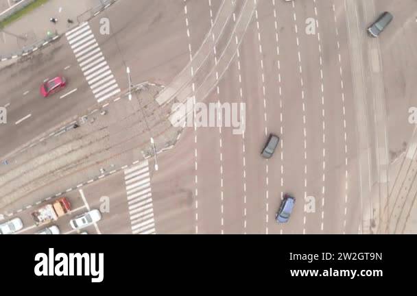 Cars pass a multi-lane complex intersection with traffic lights - drone ...