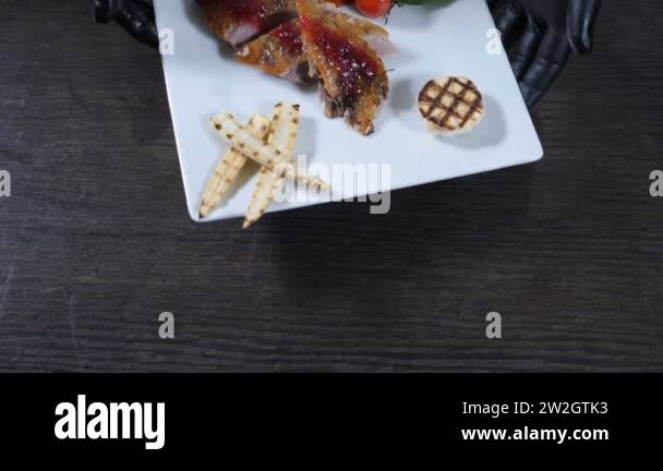 Restaurant food concept. chef presenting his food plate in kitchen of ...