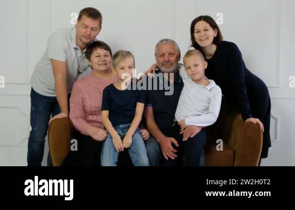 Happy big family three generations - senior, adult and junior - making ...