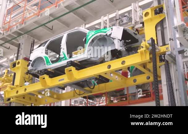 Body of car on conveyor. Modern Assembly of cars at the plant. The ...