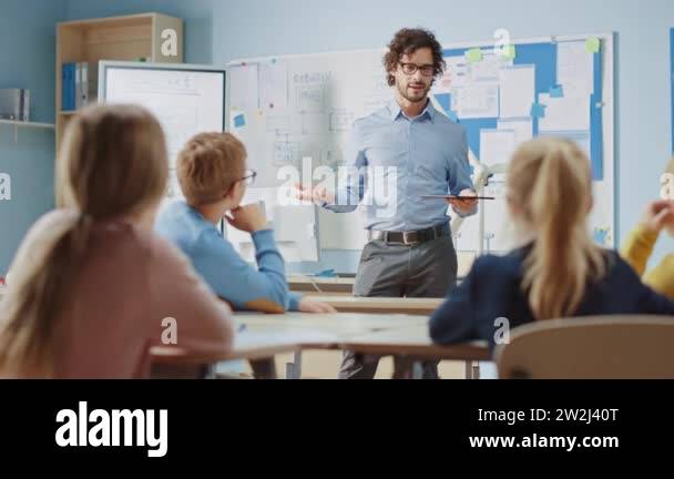 Elementary School Physics Teacher Uses Interactive Digital Tablet to ...