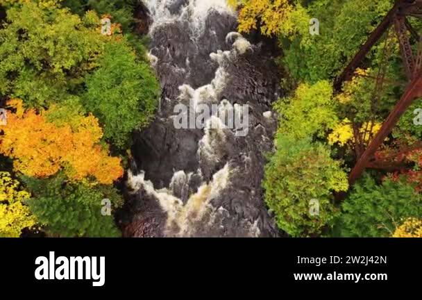 Beautiful fall pull out look down aerial from the abandoned railroad ...