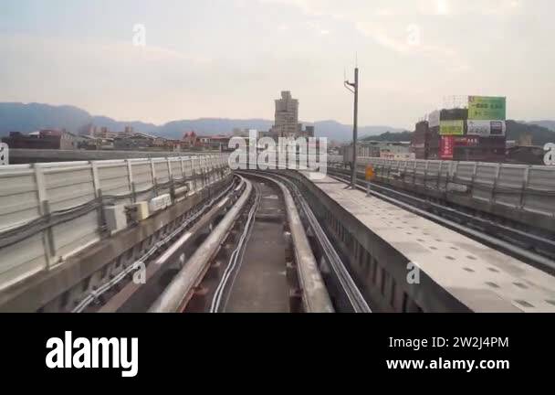 TAIPEI, TAIWAN - January 18 2015: Time-lapse An elevated train, journey ...